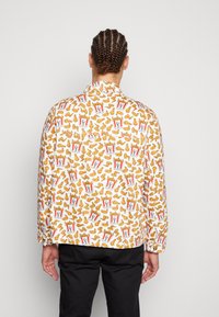 Kaotiko WORK JACKET KFC UNISEX - Veste en jean - chicken/doré - ZALANDO.FR