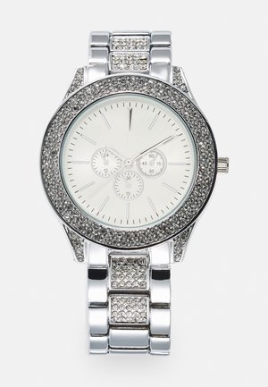 Klockor Dam online | Trendiga och fina damklockor | ZALANDO