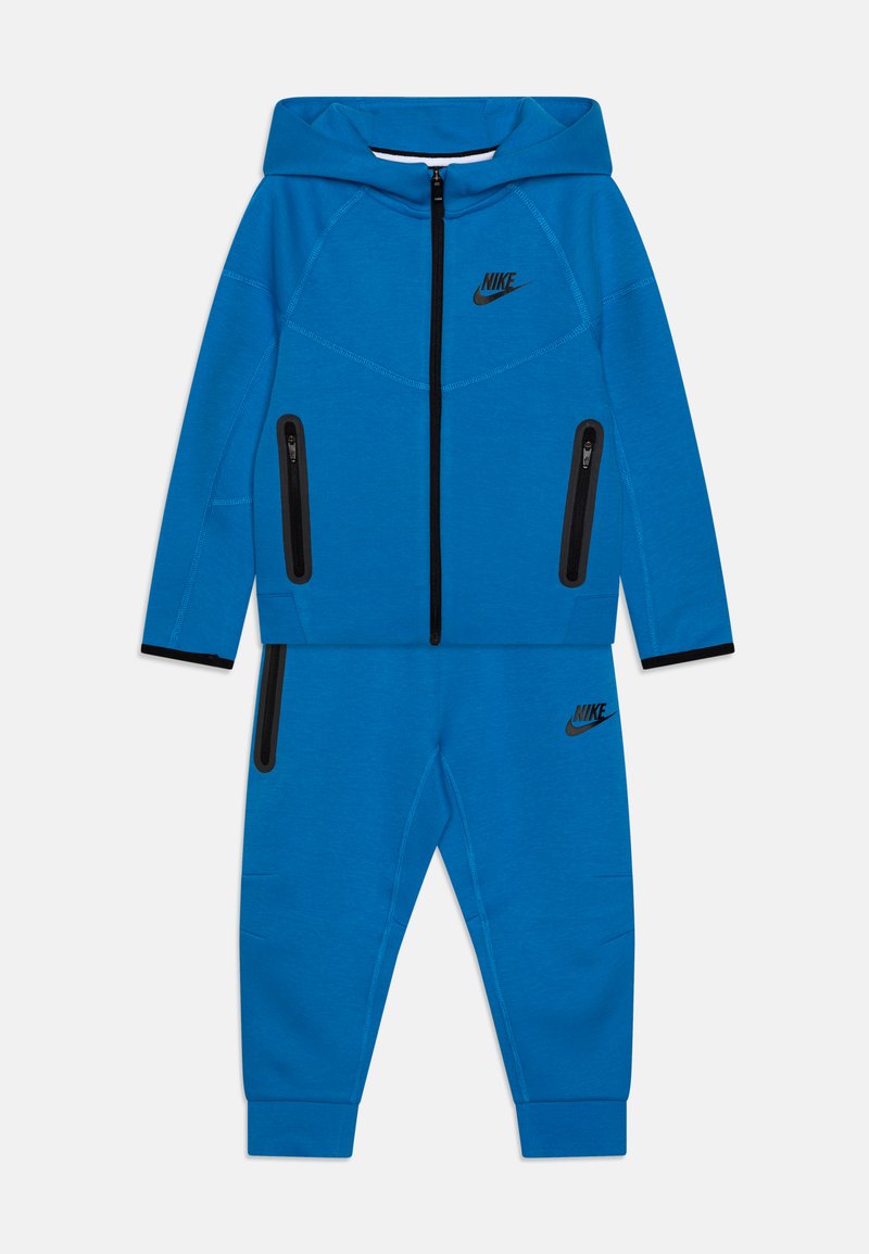 Nike Sportswear UNISEX SET - Melegítő - light photo blue/világoskék ...