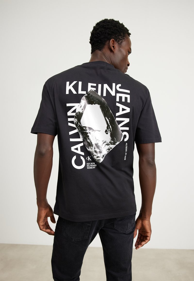 Calvin Klein Jeans STACKED MODERN METALS TEE - Print T-shirt - black ...