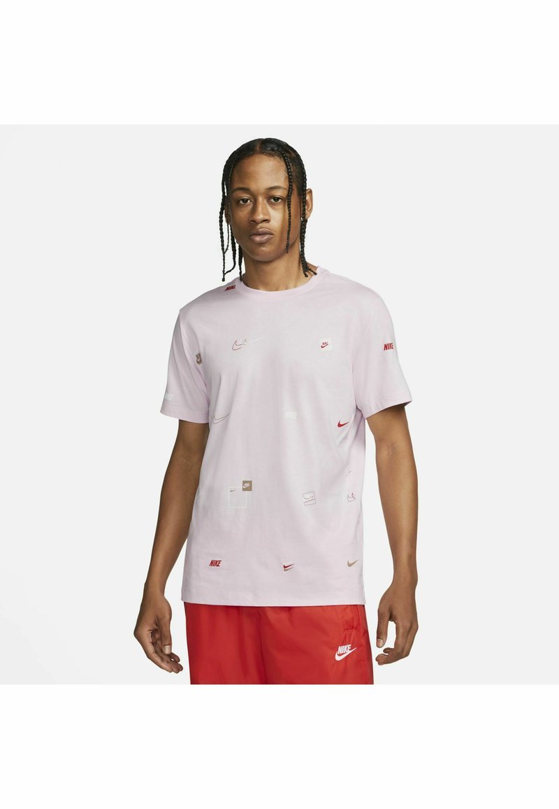 Nike Sportswear LOGO TEE - Print T-shirt - pink foam/pink - Zalando.co.uk