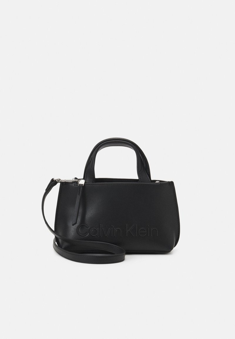 Calvin Klein MINI TOTE - Cross body bag - black - Zalando.ie