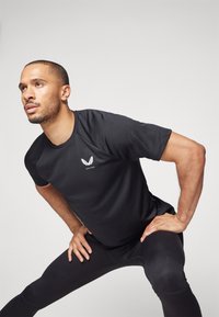 Castore TEE - T-Shirt basic - black/schwarz - Zalando.de