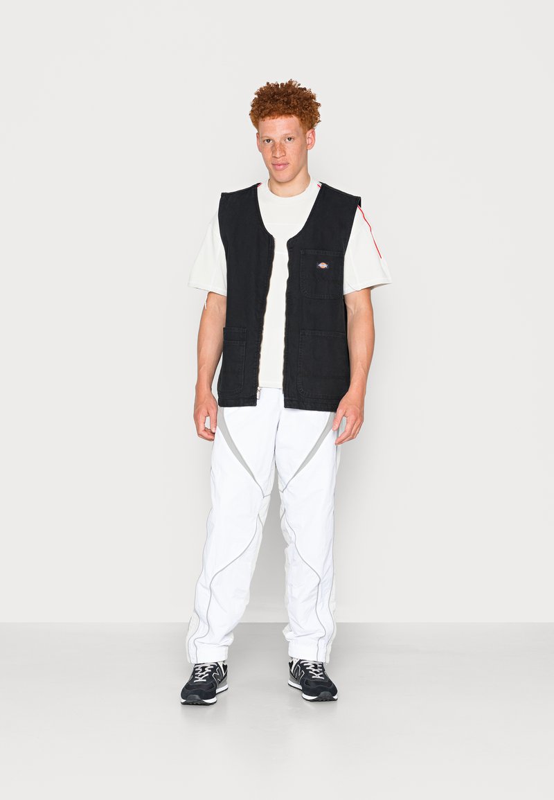 Fila FILA REDEFINED TRACK PANTS UNISEX - Pantalon de survêtement ...