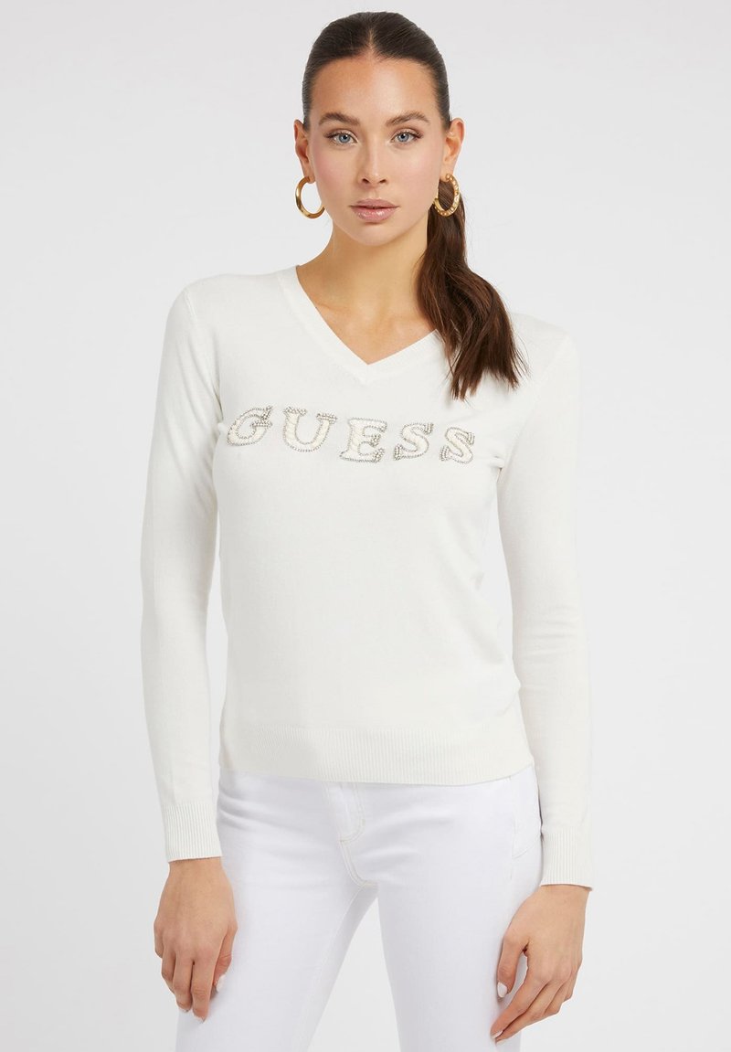 Guess Mit Strass Frontlogo Strickpullover Creme Beige Zalando De