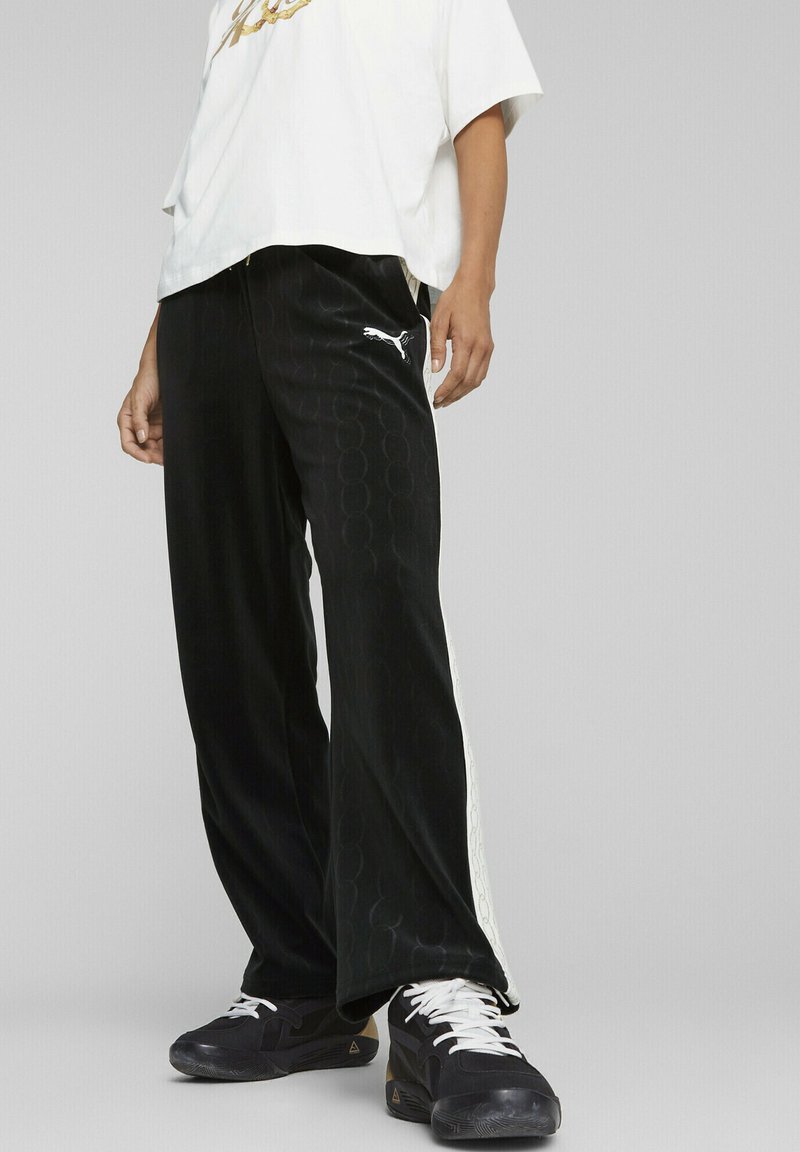 Puma Tracksuit bottoms - black - Zalando.ie