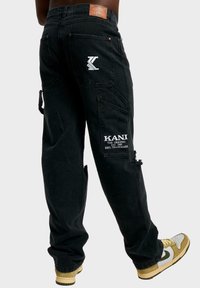 Karl Kani KK RETRO BAGGY WORKWEAR KNEE CUT DE - Jeans Straight Leg - bleachedblack/schwarz ...