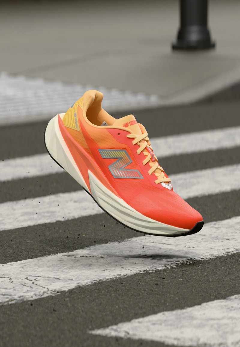 New Balance FUELCELL REBEL V5 - Road running shoes - tangerine heat ...