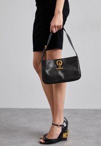 MOSCHINO METAL TOGGLE - Handbag - black - Zalando.ie