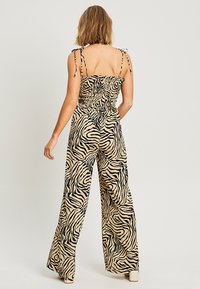 CALLI JENNI - Jumpsuit - beige tiger/nude - Zalando.de