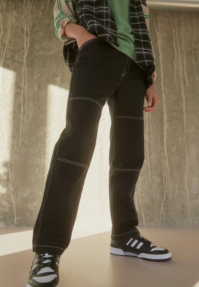 Champion Rochester STRAIGHT HEM PANTS - Relaxed fit jeans - black ...