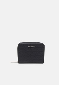Calvin Klein MUST WALLET EMBOSS - Wallet - black - Zalando.co.uk