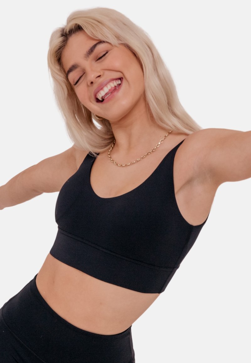 Araa Active TUSCAN - Medium support sports bra - black - Zalando.de