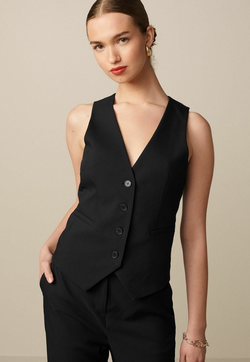 Next STRETCH - Weste - black/schwarz - Zalando.de