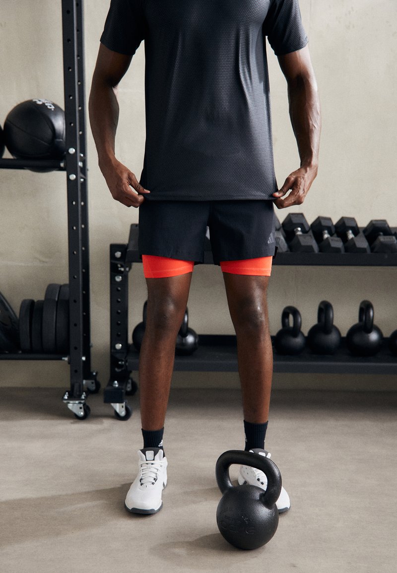 adidas Performance 2IN1 POWER - Sports shorts - black bright red black ...