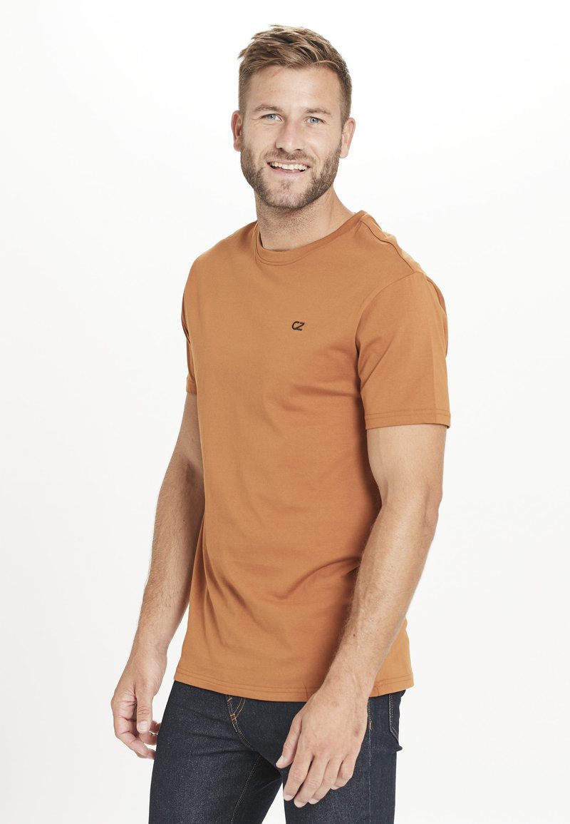 Cruz T-Shirt basic - roasted pecan/orange - Zalando.de
