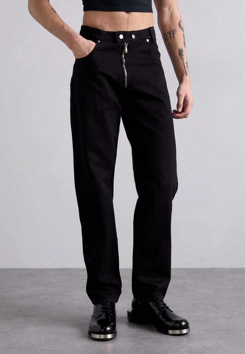 GmbH TROUSERS WITH OPEN BACK - Trousers - black - Zalando.co.uk
