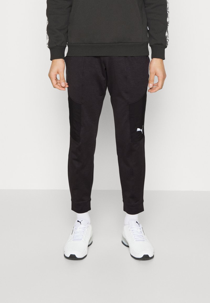 Puma TRAIN CLOUDSPUN JOGGER - Tracksuit bottoms - black heather/black ...