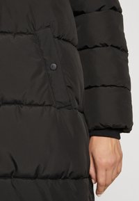 Pieces Curve PCKATJA LONG PUFFER JACKET - Winter coat - black - Zalando ...