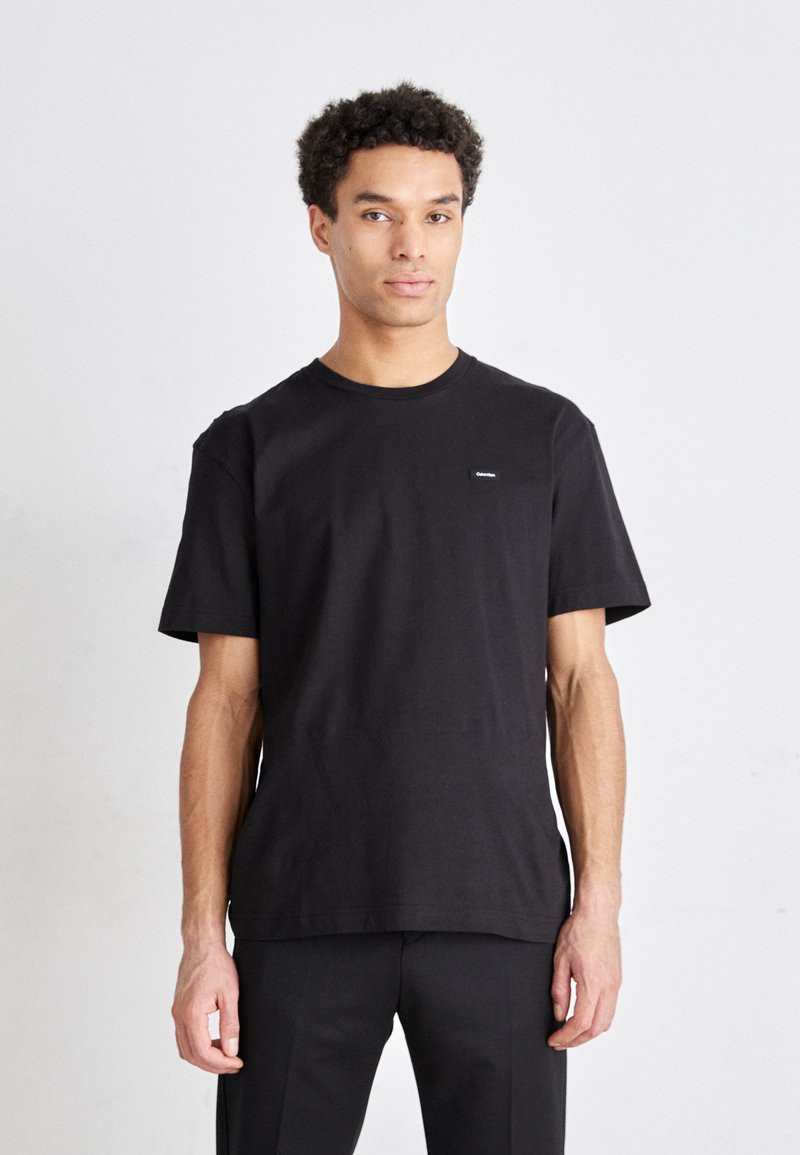Calvin Klein COMFORT FIT - Basic T-shirt - black - Zalando.co.uk