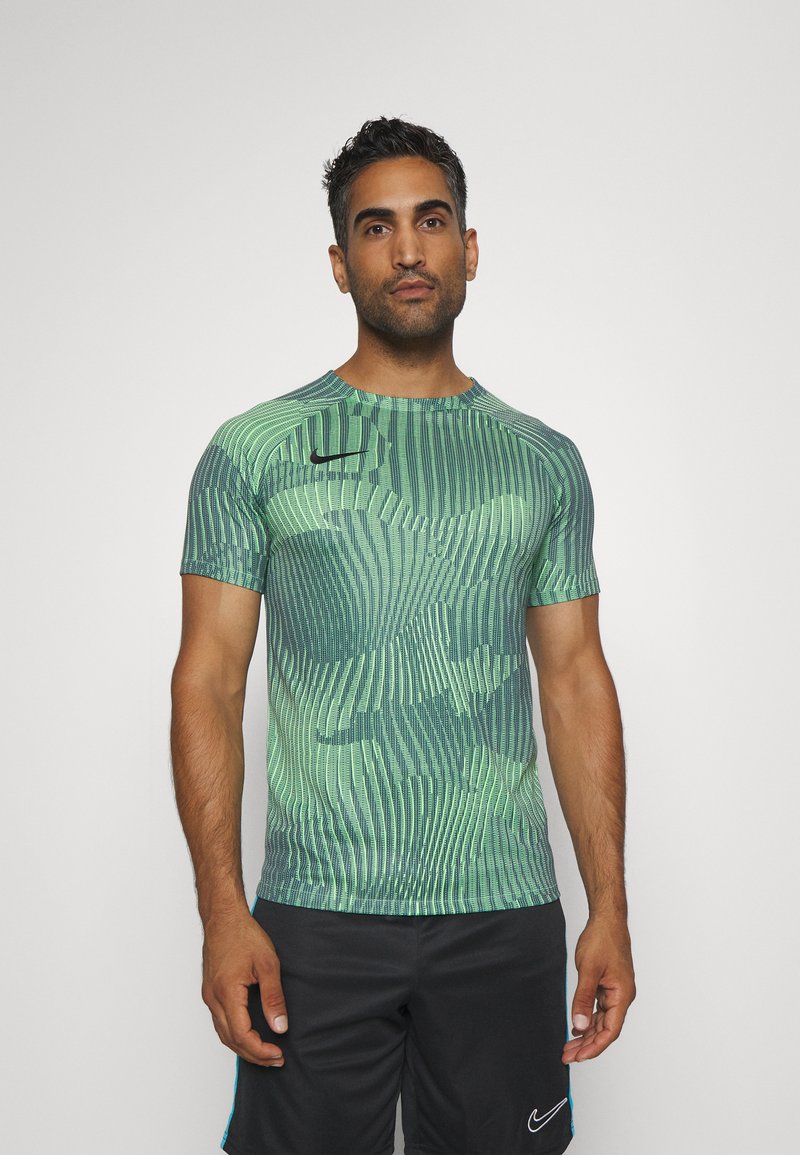 Nike Performance ACADEMY - Sports T-shirts - lime blast/neongrøn ...