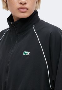 Lacoste Sport Training jacket - black/white/black - Zalando