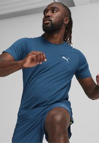 Puma RUN CLOUDSPUN TEE - Camiseta deportiva - ocean tropic/azul ...