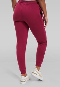 Karl Kani Jogginghose - berry/beere-meliert - Zalando.de
