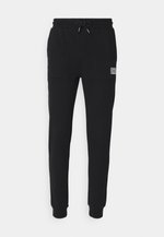 KARL LAGERFELD PANTS - Tracksuit bottoms - black/white/black - Zalando.ie