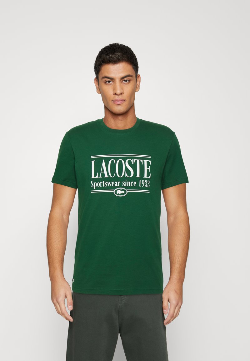 Lacoste UNISEX - Nyomott mintás póló - vert/zöld - Zalando.hu