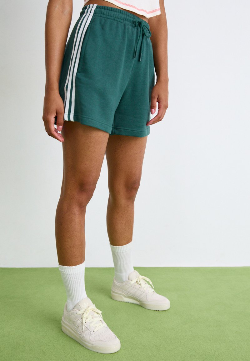 adidas Originals Teplákové kalhoty - mineral green/zelená - Zalando.cz