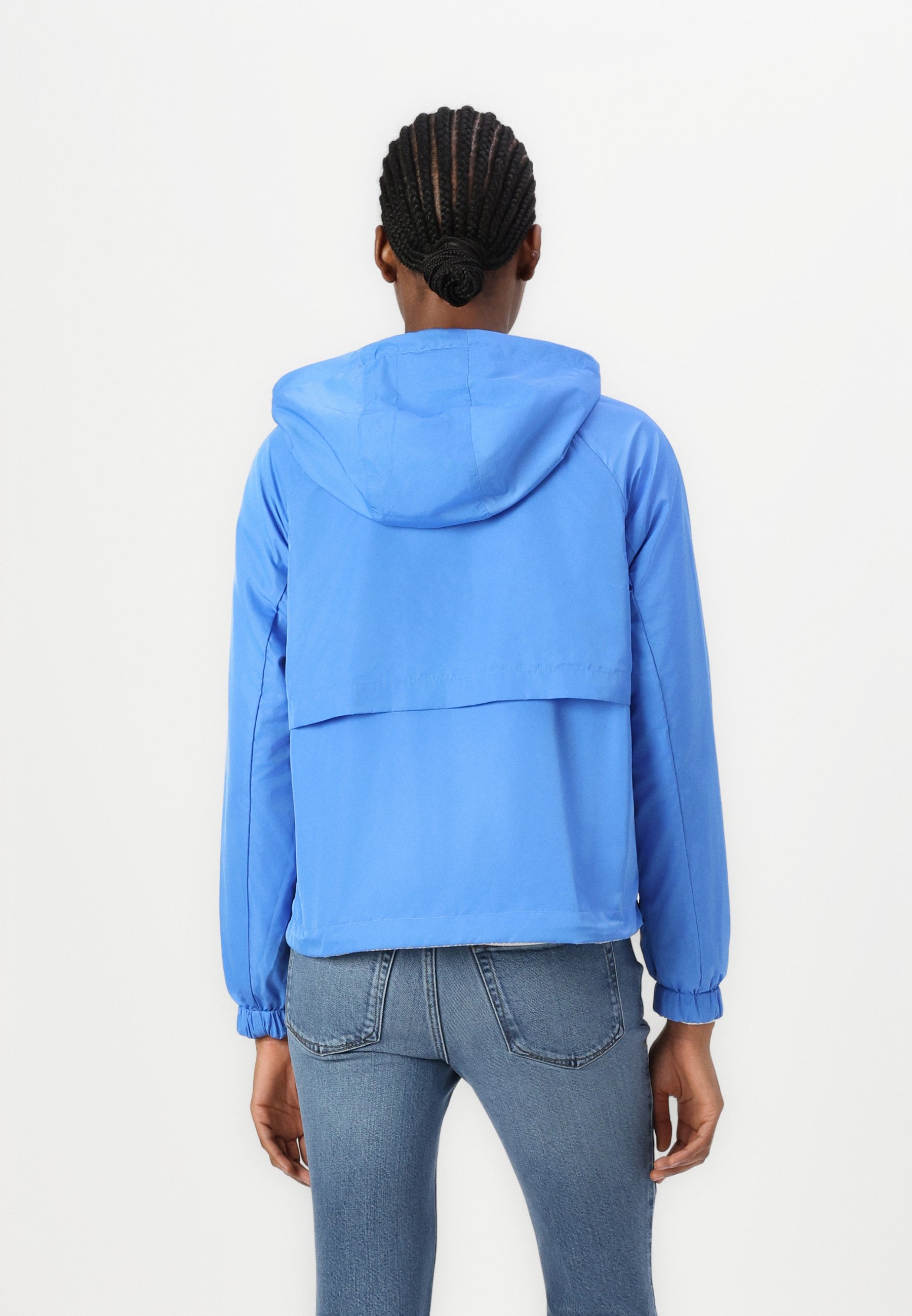 Baby blue tommy hilfiger windbreaker store