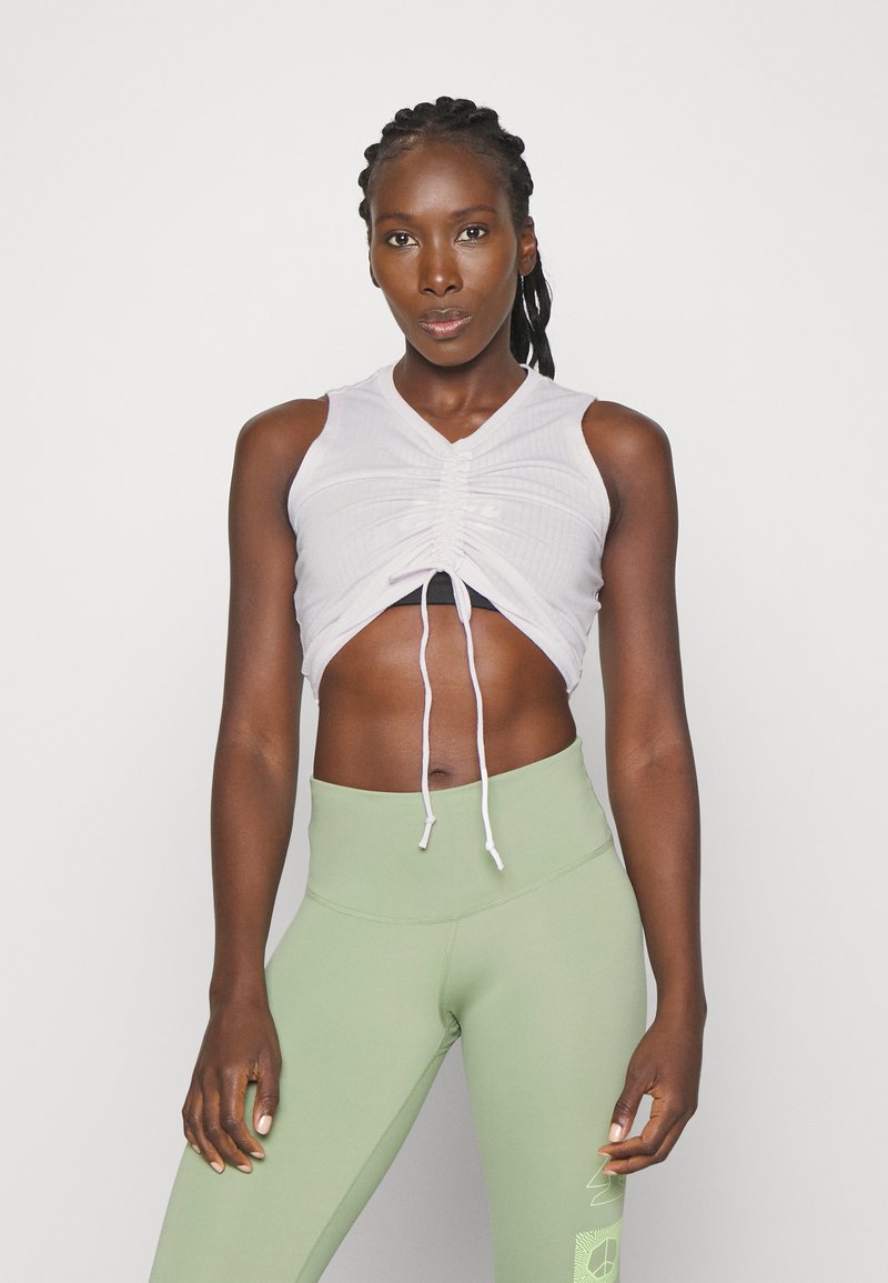 Nike Performance TANK TIE - Sports T-shirt - pearl pink/light pink ...