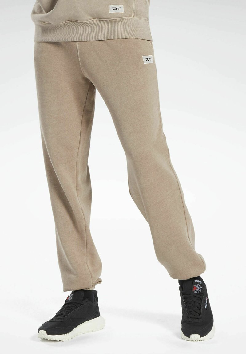 Reebok Classic CLASSICS NATURAL DYE - Tracksuit bottoms - taupe ...