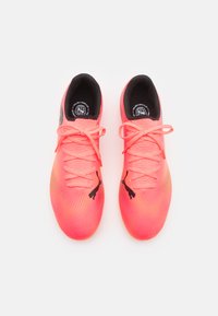 Puma FUTURE 7 PLAY FG/AG - Moulded stud football boots - sunset glow ...