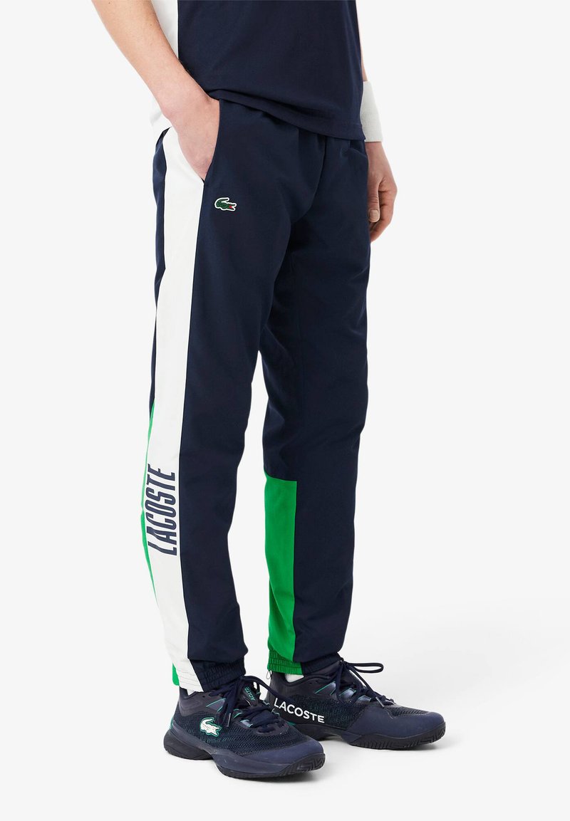 Lacoste Sport Tracksuit bottoms - navy blue white calathea/dark blue ...