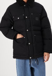 Carhartt WIP Winter jacket - black - (Pre-owned) - Zalando