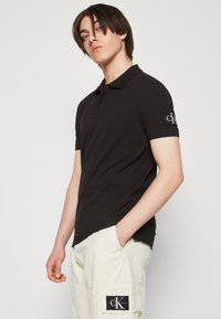 Calvin Klein Jeans BADGE - Piké - black/svart - Zalando.se