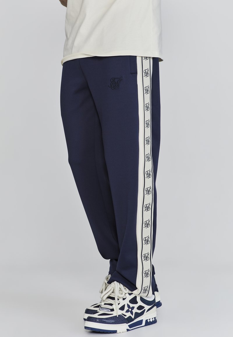 SIKSILK Jogginghose - black/dunkelblau - Zalando.de