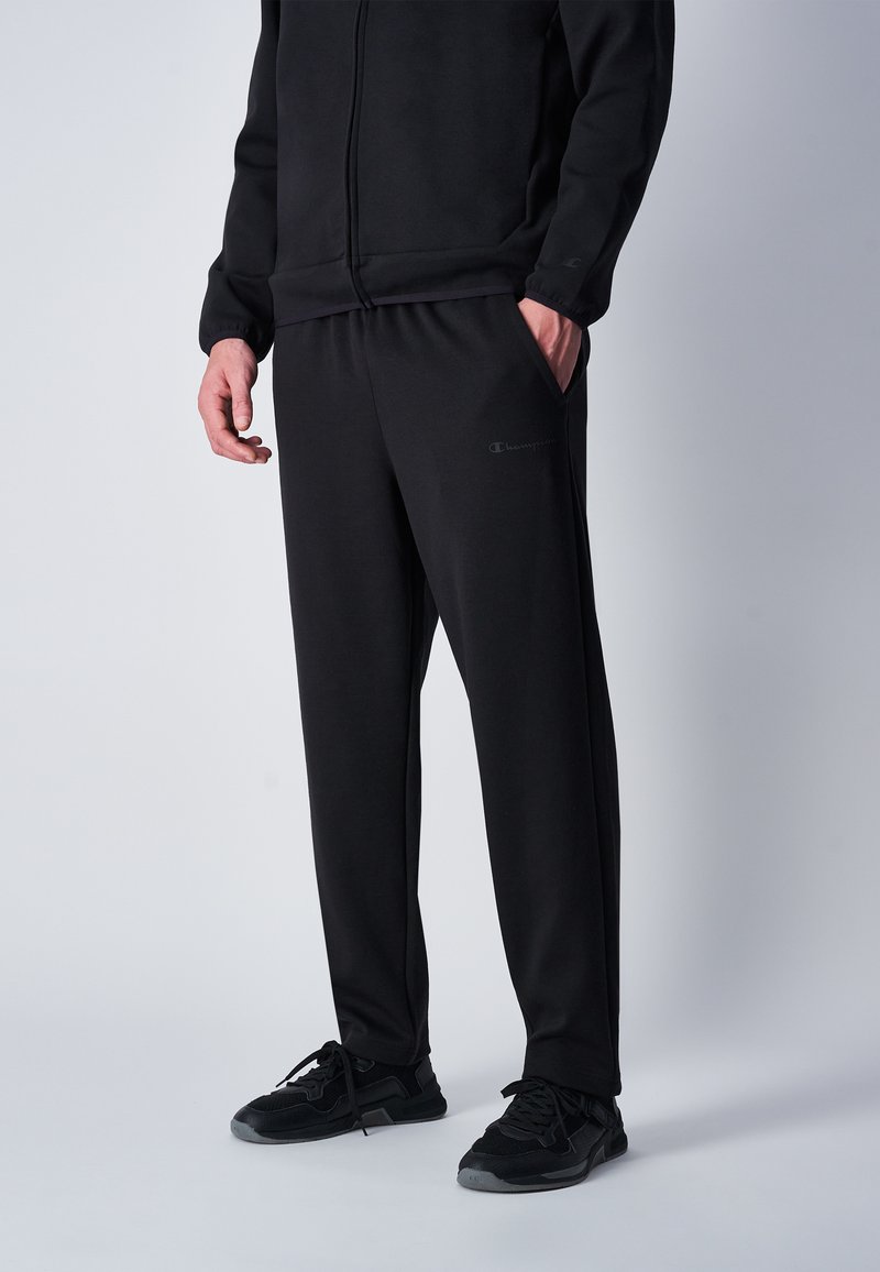 Champion TECH AMERICAN - Jogginghose - black/schwarz - Zalando.de