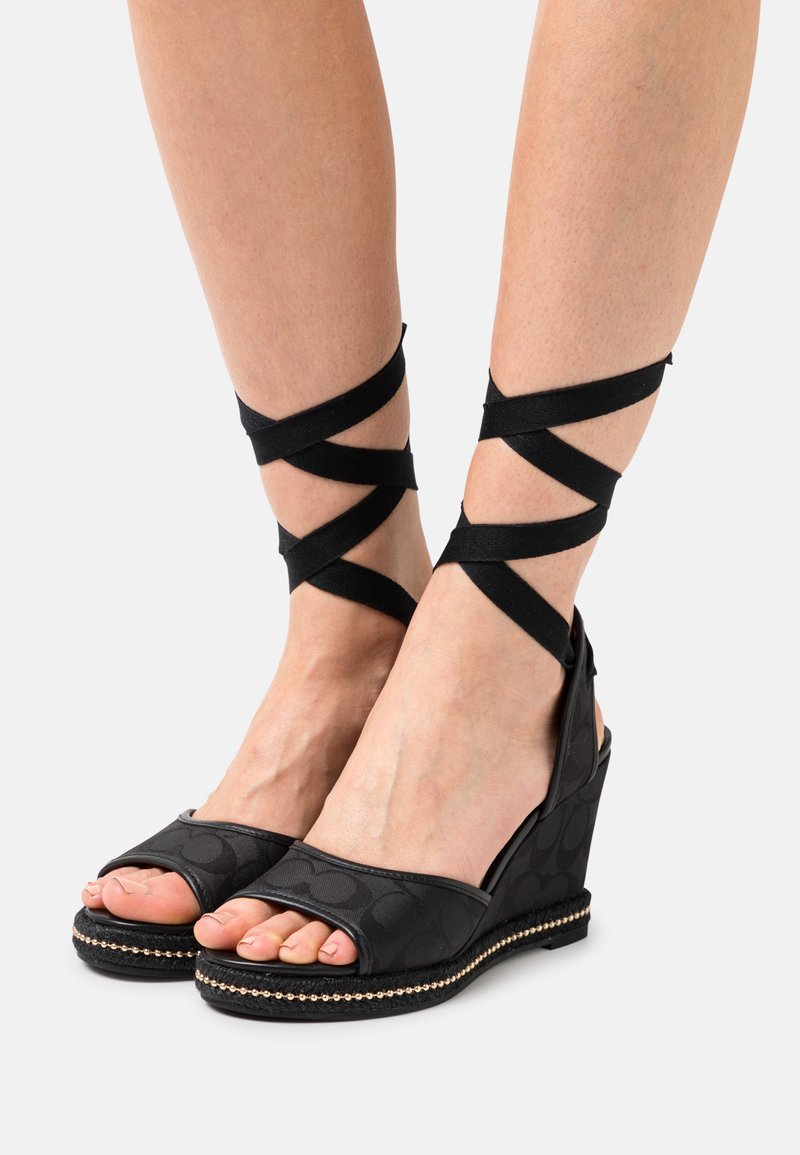Coach PAGE RECYCLED WEDGE - Wedge sandals - black - Zalando.co.uk