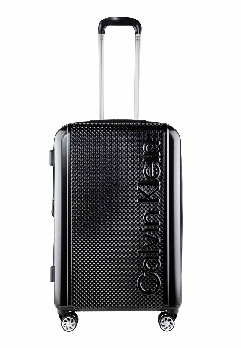 Calvin Klein WAFFLE - Wheeled suitcase - black - Zalando