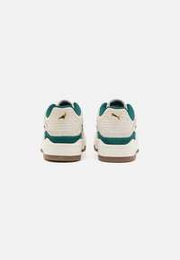 Puma SLIPSTREAM STAPLE UNISEX - Sneaker low - pristine/malachite ...
