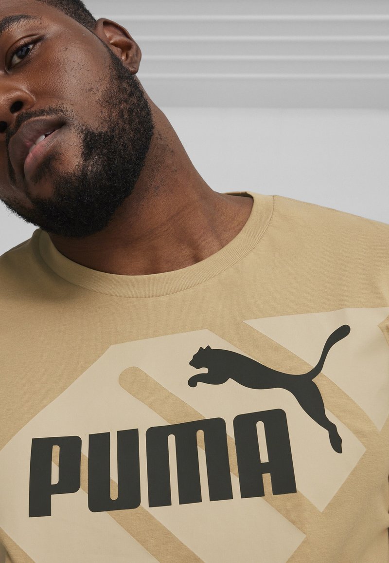 Puma POWER GRAPHIC - T-Shirt print - prairie tan/beige - Zalando.ch