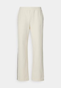 MCM ESSENTIAL - Tracksuit bottoms - ivory/off-white - Zalando.co.uk