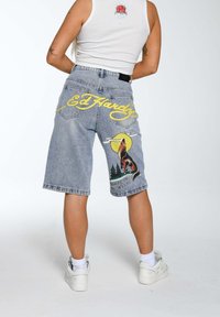 Ed Hardy BORN WILD - Shorts di jeans - bleach/denim délavé - Zalando.it