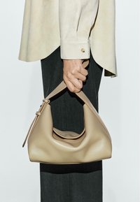 Massimo Dutti SMALL - Handbag - sand - Zalando