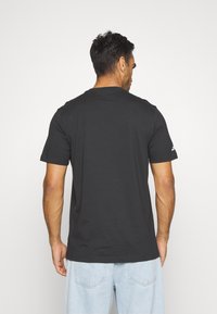 adidas Performance LILSTRIPE META - T-shirt imprimé - black/noir ...
