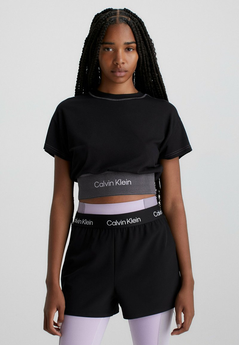 Calvin Klein Performance CROPPED GYM - Sports T-shirt - black beauty ...