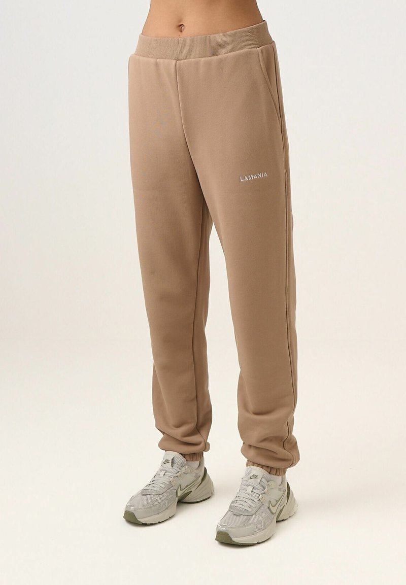 LA MANIA Teplákové kalhoty - beige/béžová - Zalando.cz